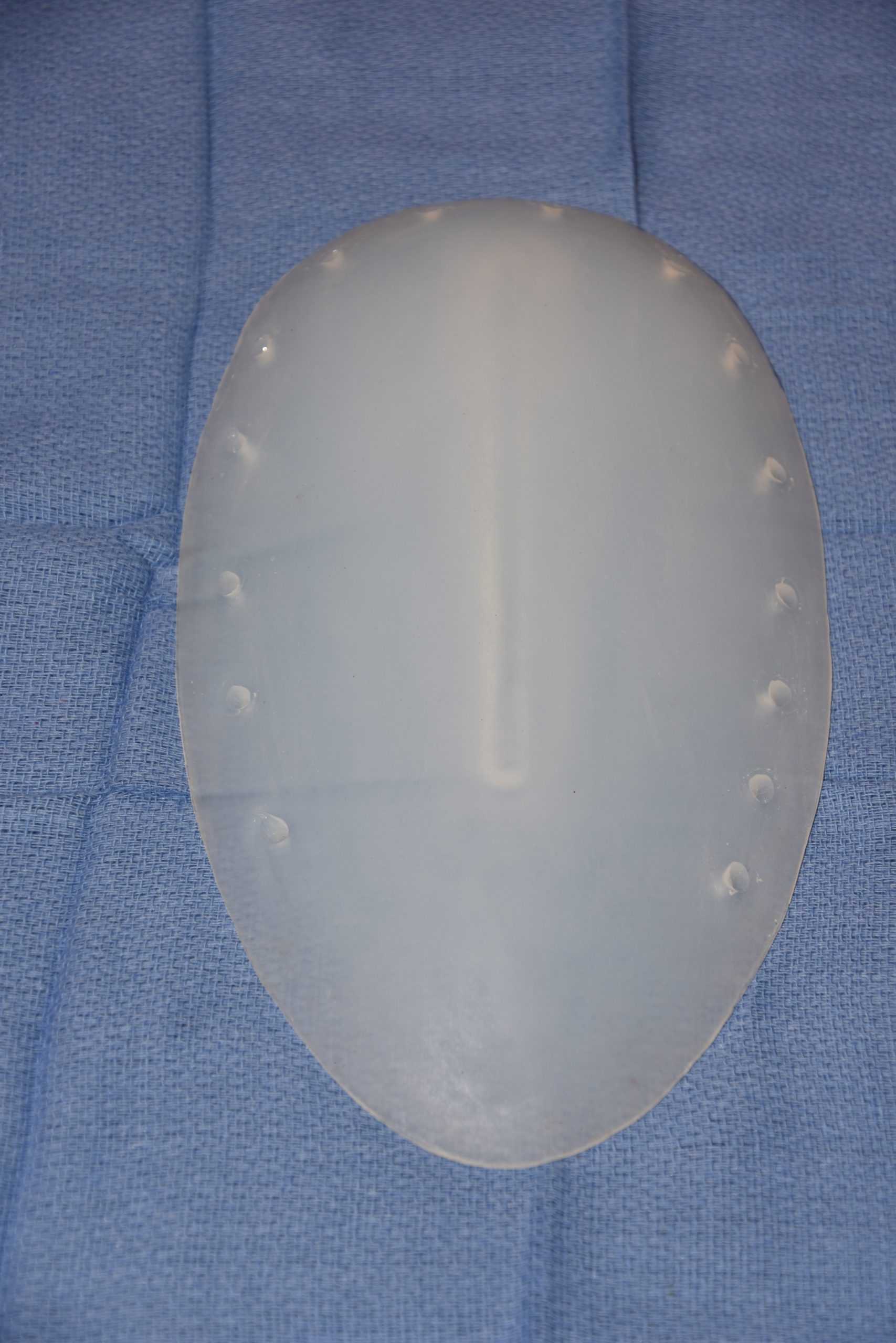 Body Implant Surgery - Body Augmentation Surgeon